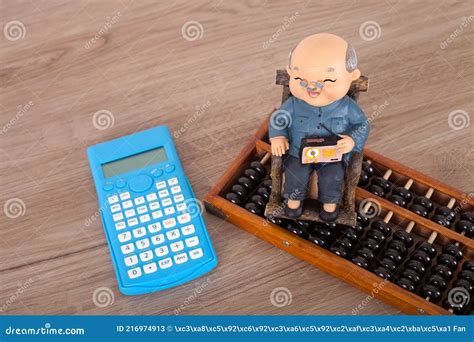 Two Calculation Tools And The Kind Old Grandpa Model Stock Image