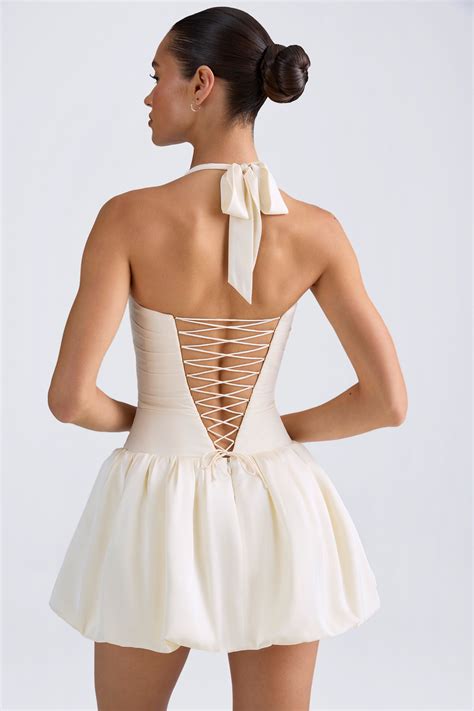 Ludmila Halterneck Lace Up Bubble Hem Corset Micro Mini Dress In Ivory