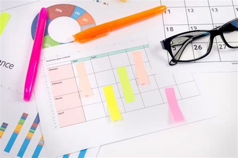 Premium Photo Working Set For Analyzing Statistics Charts And Graph With Financial Data Glasses