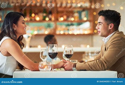 Theres A Magic Between Them An Affectionate Young Couple Holding Hands