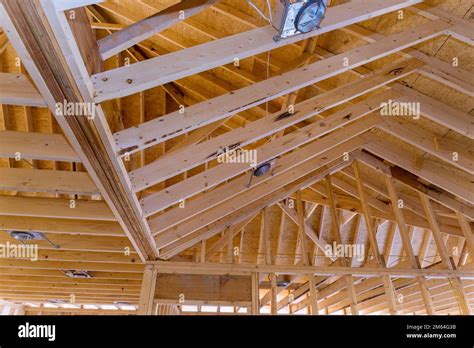 Installation Spotlight Lamp Lighting System In New Home Construction By