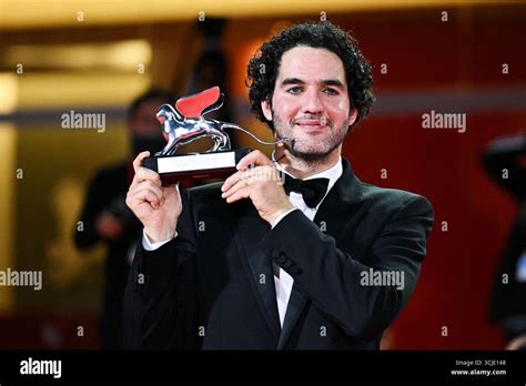 Benny Safdie Poses With The Silver Lion For Best Director For The
