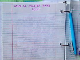 An Open Notebook With Writing On It And A Blue Pen Next To The Page That Says Name Of Charter