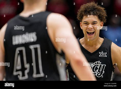 Cincinnatis Dan Skillings Jr 0 Celebrates With Teammate Simas Lukosius 41 Following The