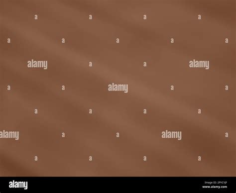 Diagonal Rays Of Light On A Beige Or Brown Background Blurred Abstract