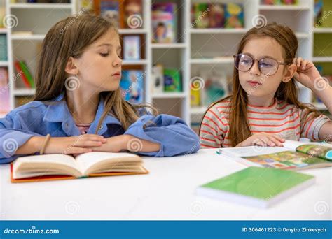Female Girls Reading Books In Library Stock Image Image Of Lesson