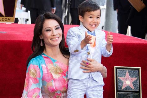 See Lucy Lius Rare Photos With Son Rockwell Lloyd