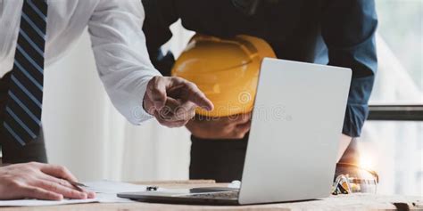 Architect Team Working With Blueprints For Architectural Plan Engineer