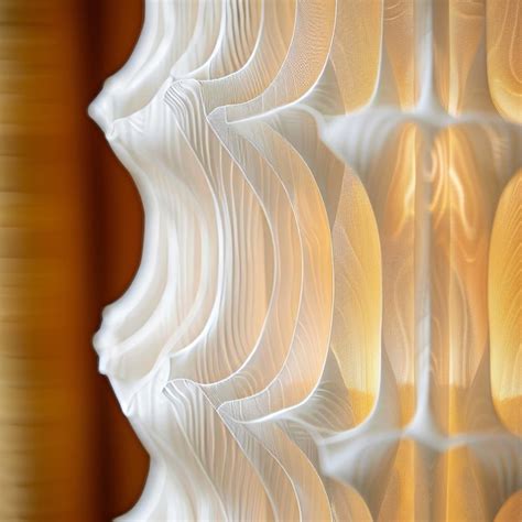 Closeup Of A White Abstract Textured Fabric Sculpture With Wave Patterns Lit From Inside