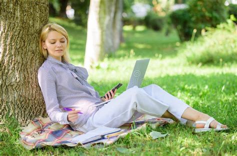 Education Technology And Internet Concept Woman With Laptop Computer Work Outdoors Lean On Tree