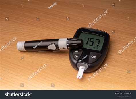 Electronic Glucometer On Table Over 53 Royalty Free Licensable Stock