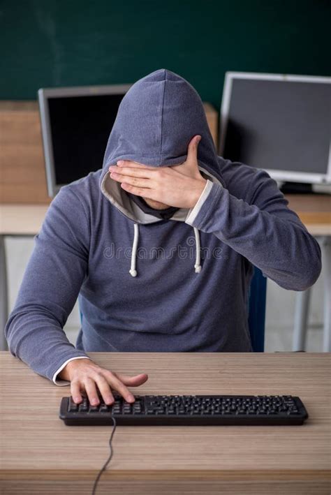 Young Male Hacker Sitting In The Classroom Stock Image Image Of Cyber
