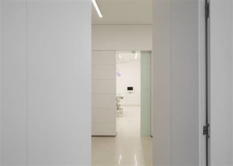 Fluid Architecture Adds Secret Doors Inside Serbian Clinic