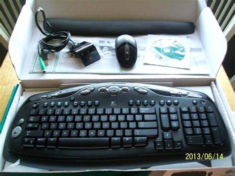 Logitech Lx 300 Cordless Desktop Keyboard And Optical Mouse