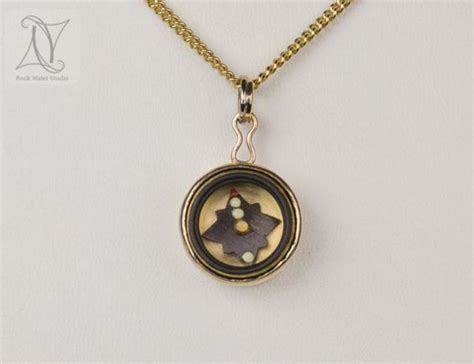 Simple Gold Compass Rock Water Studio