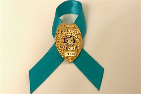 University Police Wear Teal Ribbons For Sexual Assault Awareness Month