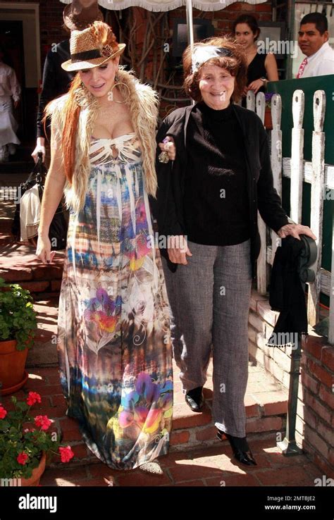 Phoebe Price Strikes A Seductive Pose As She Shows Off Her Lunch While