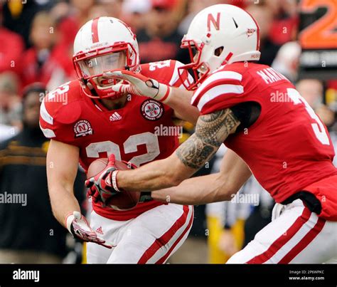 Nebraska Running Back Rex Burkhead 22 Takes The Ball From Quarterback