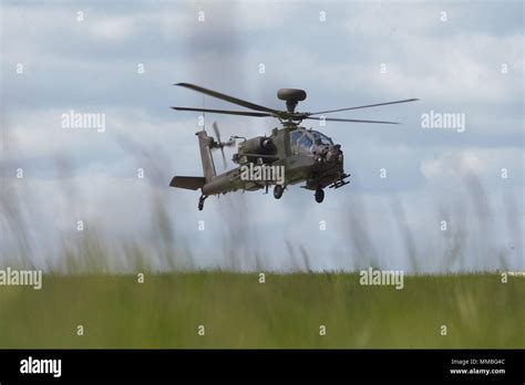 An Apache Helicopter On Display At Wattisham Airfield In Suffolk As The 3 Regiment Army Air