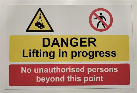Danger Lifting In Progress No Unauthorised Persons Beyond This Point