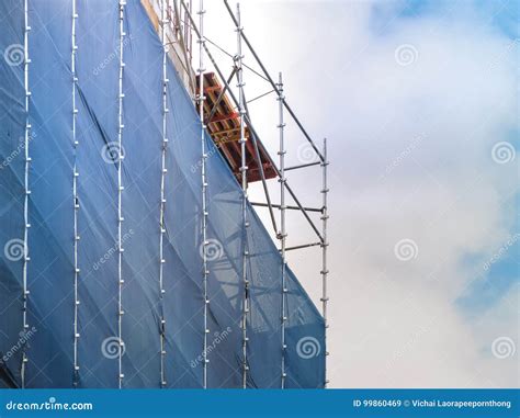Steel Scaffolding With Canvas Barrier Dust For Restoration Of Building