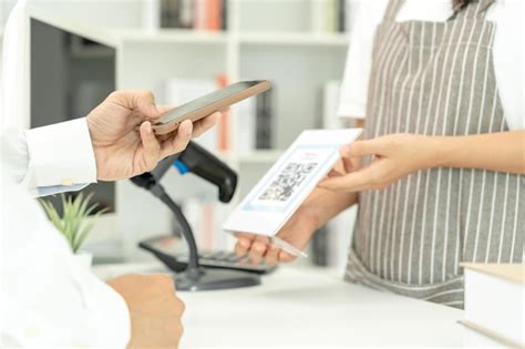 Premium Photo Closeup Of A Hand Hold Smartphone And Scanning QR Code Payment Accepted Generate