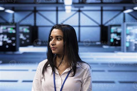 Manager Overseeing Server Room Walking Around Troubleshooting
