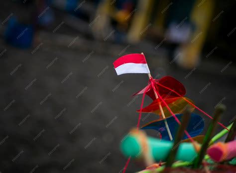 Premium Photo A Miniature Indonesian Flag In A Toy Ship Shallow Focus