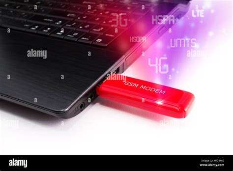 Laptop With A Modern Modem Stock Photo Alamy