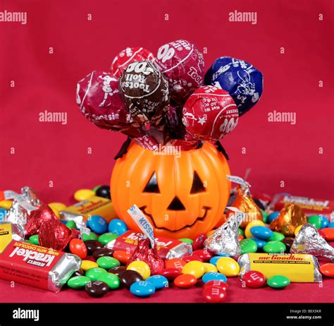Small Plastic Halloween Pumpkins Filled With And Surrounded By Trick Or