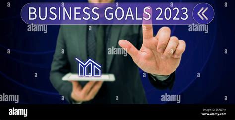 Hand Writing Sign Business Goals 2023 Word Written On Advanced Capabilities Timely Expectations