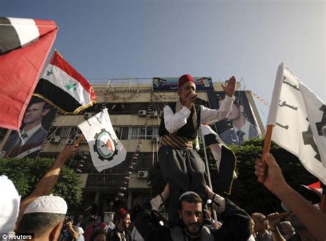 Bashar Assad And British Born Wife Vote In Syria S Sham Elections Daily Mail Online