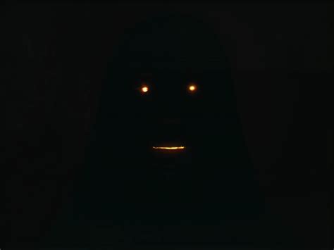 A Dark Picture Of A Person With Glowing Eyes In The Dark Seaart Ai