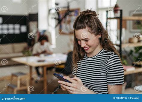 Young Woman Having Break At Work Scrolling Her Phone Stock Image Image Of Break Female