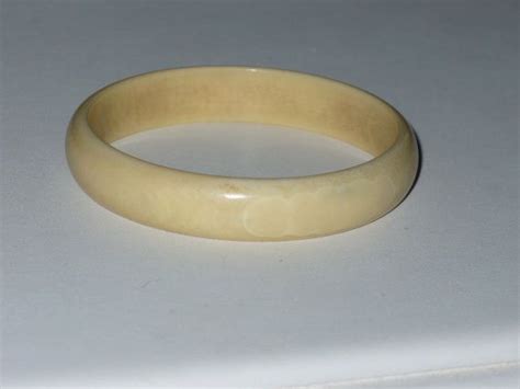 Vintage Faux Ivory Hand Carved Bangle Bracelet Exquisite And Timeless