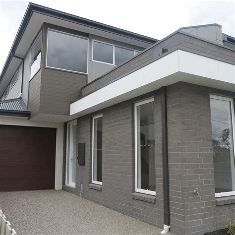 White Matrix Cladding On Front Facade Matrix Cladding In Light Grey Stria 255mm In Dark Grey