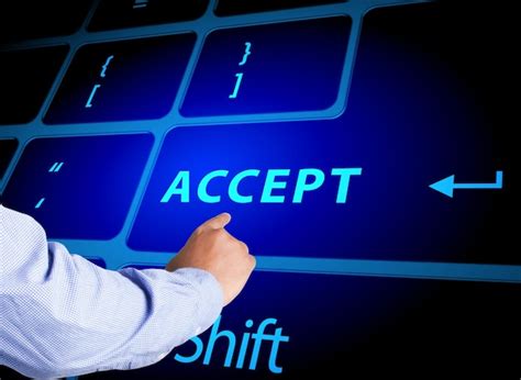 Premium Photo Hand Pressing Accept Keyboard Button