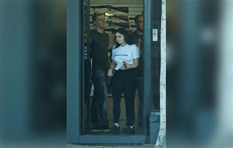 Ariel Winter Bares Midriff While Getting Gun Permit With Babefriend Levi Meaden