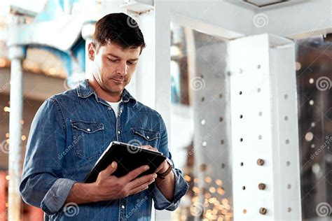 Male Interior Designer Tablet And Networking In Creative Workplace For Idea Research Or