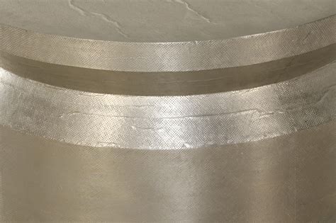 West Elm Accordion Metal Wrapped And Hand Hammered Coffee Table Ebth