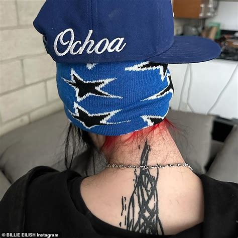 Billie Eilish Shows Off The Top Of A Massive Back Tattoo As She