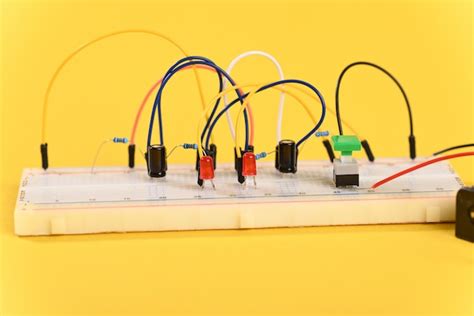 Premium Photo Breadboard With Electrical Elements Multivibrator Circuit