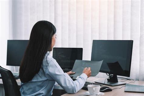 Premium Photo Asian Woman Software Developers Sitting In Front Of