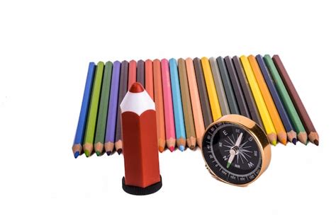 Premium Photo Colour Pencil With Compass Pen And A Globe