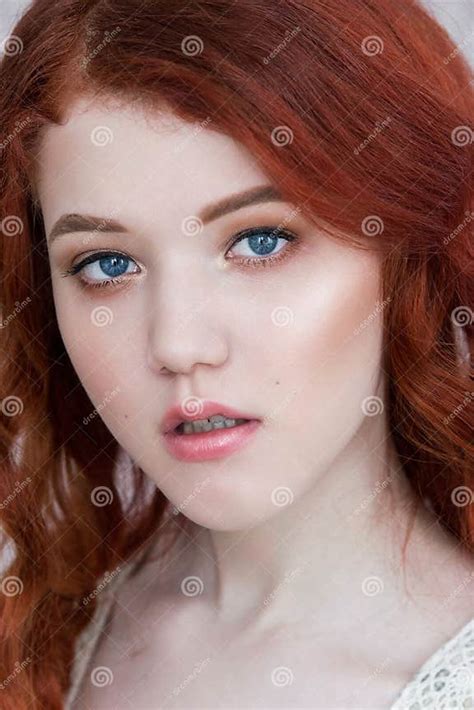 Tender Retro Portrait Of A Young Beautiful Dreamy Redhead Woman Stock