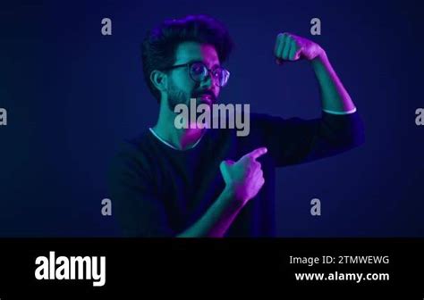 Proud Slim Weak Arabian Man Coder Guy Technology Hacker Show Hands Muscle Bicep Sport Strong