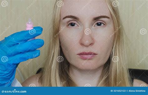 Examination Of The Fundus And Dilated Pupils A Doctor Performs An