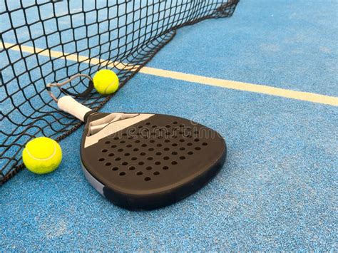 Padel Racket On A Padel Blue Court With A Ball Stock Image Image Of Equipment Racket 332919023