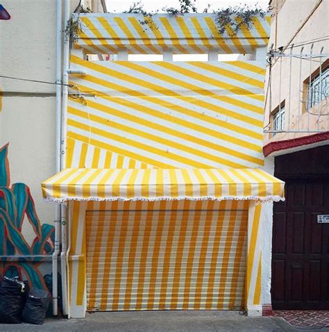 Little Rug Shop Cute Storefront Design Colorful Striped Awning Shop