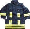 Die Schutzkleidung Eineser Feuerwehrmannesfrau In Seck An 365 Tagen
